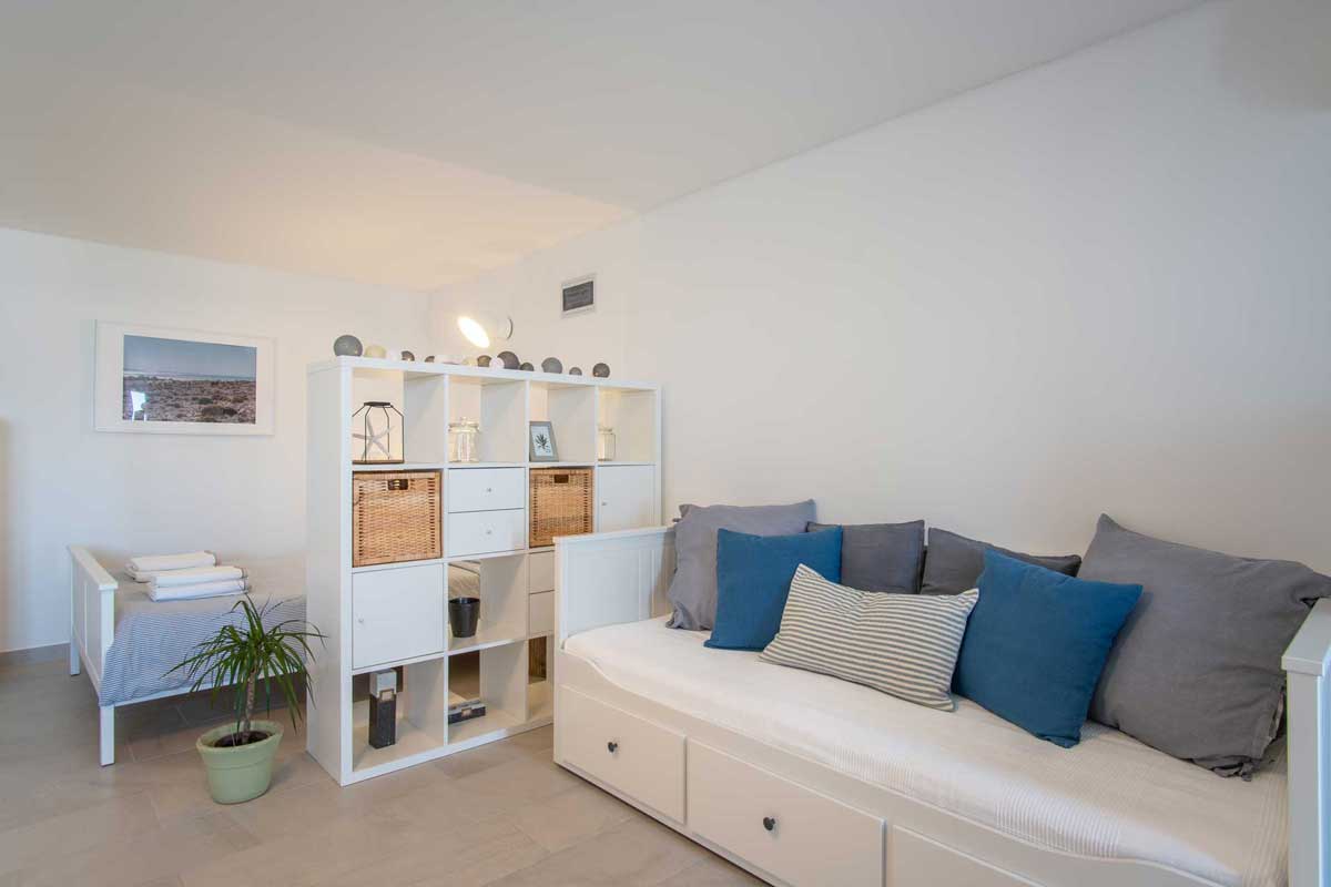 A White Cliffside Studio Apartment